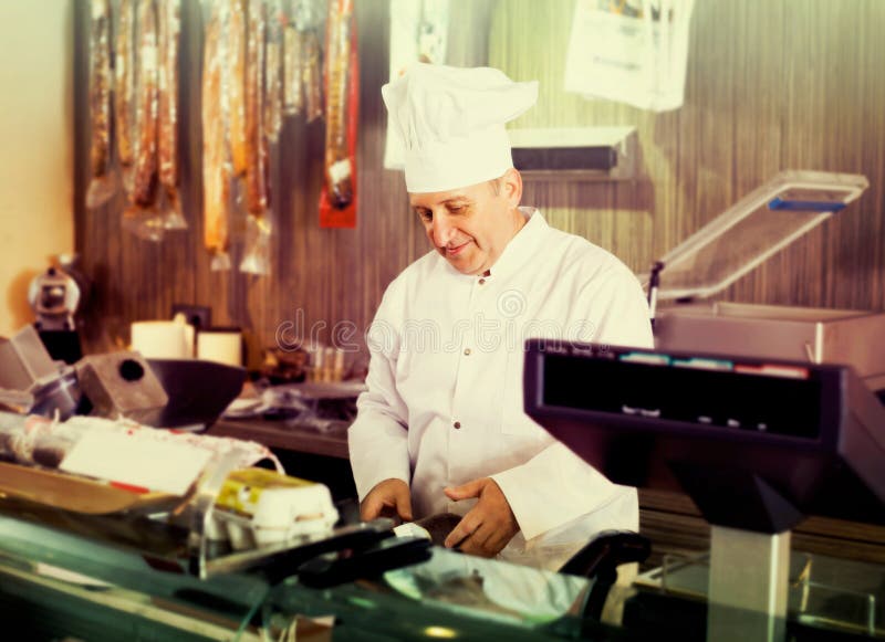 Butcher with Wurst at Counter Stock Image - Image of sale, male: 79965435