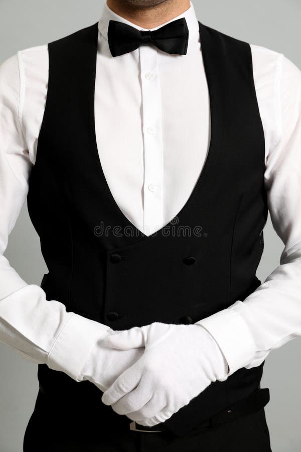 Butler in Elegant Uniform on Grey Background, Closeup Stock Image ...