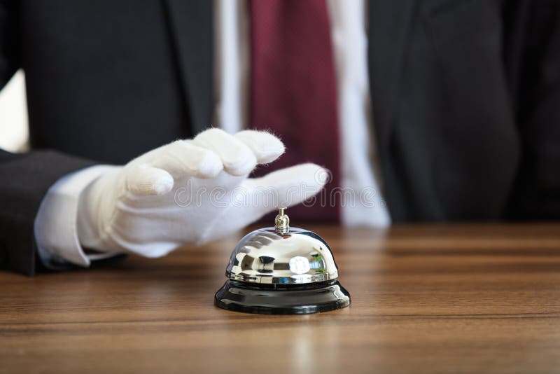 Butler Service Bell on a Wooden Desk Stock Photo - Image of client ...