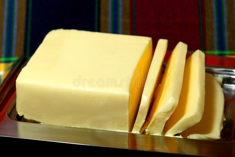 One Brick of Fat Butter or Margarine on Blue Table on Kitchen. Copy ...
