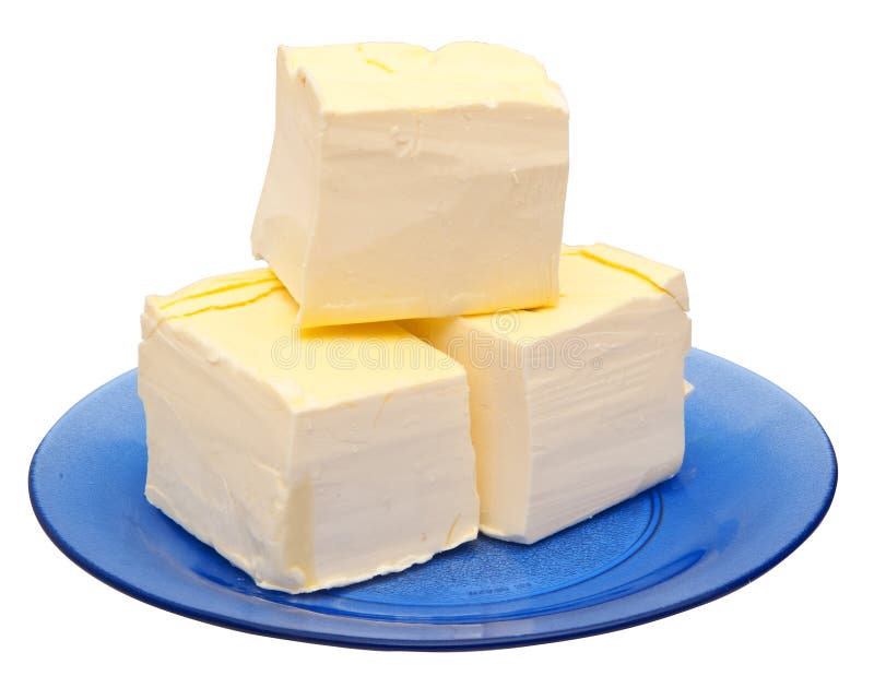 Butter on a blue plate stock photo. Image of creamy - 128506952
