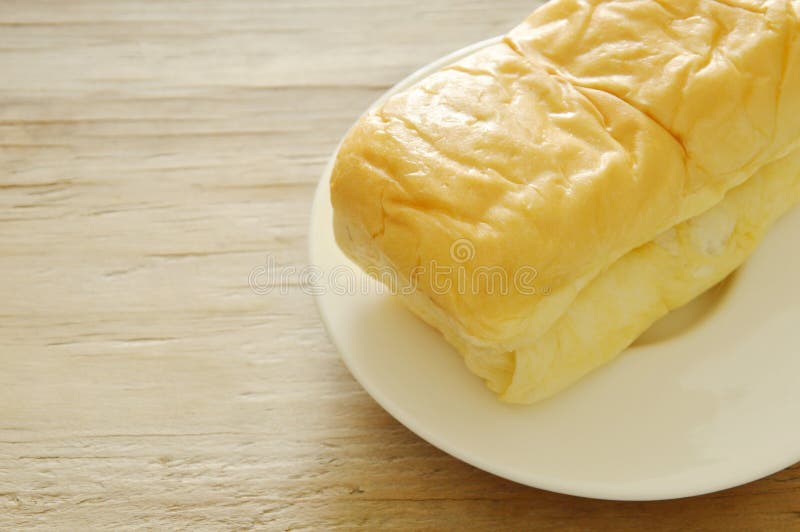 Butter bread loaf on plate stock image. Image of carbohydrate - 91557589