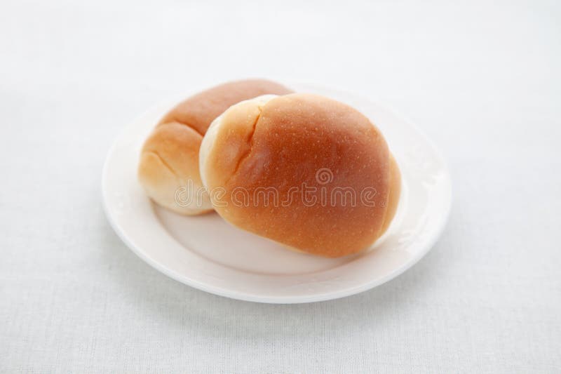 Butter Bread Table Rolls on Plate Isolated on Table Stock Photo - Image ...