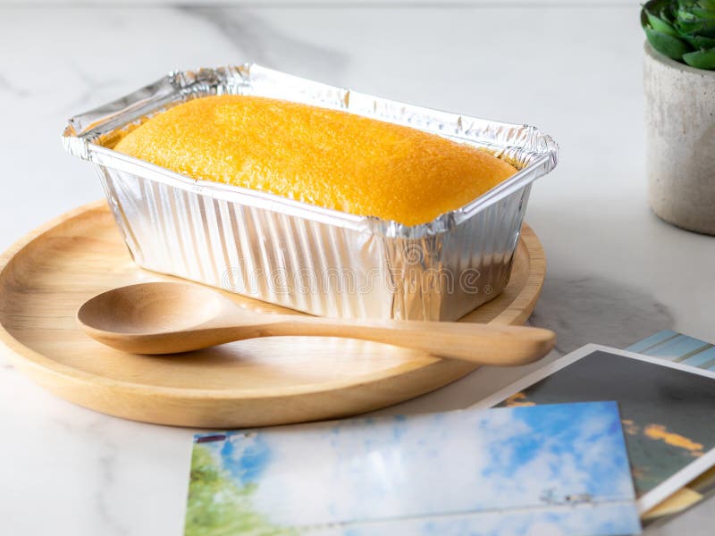 Butter Cake on Round Wooden Plate on Marble Desktop in Side View Stock ...