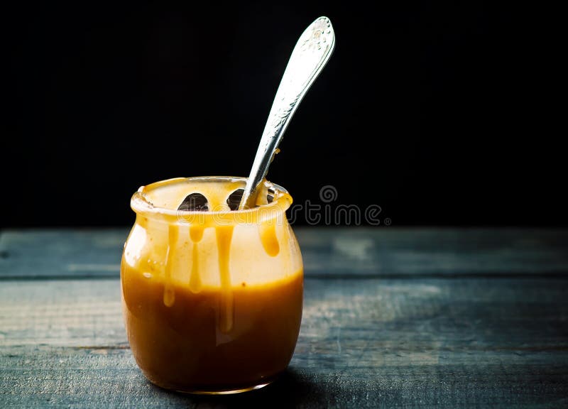 Butter Caramel in a Glass Jar Stock Image - Image of delicious ...