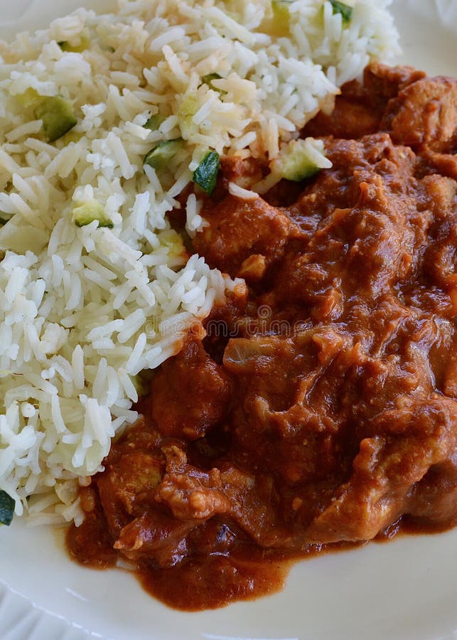 Butter Chicken and Basmati Rice on a White Plate Stock Image - Image of ...