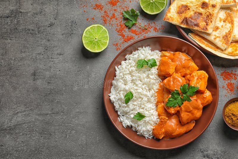 Butter Chicken with Rice Served on Grey Table, Flat Lay Stock Image ...
