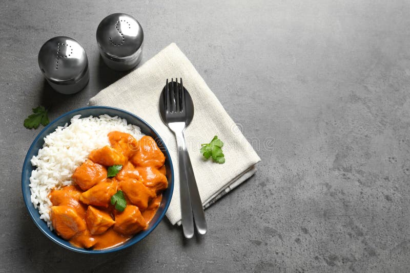 Butter Chicken with Rice Served on Grey Table, Flat Lay Stock Image ...