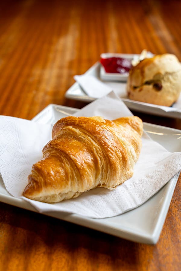 Butter croissant on plate stock photo. Image of croissant - 160801776