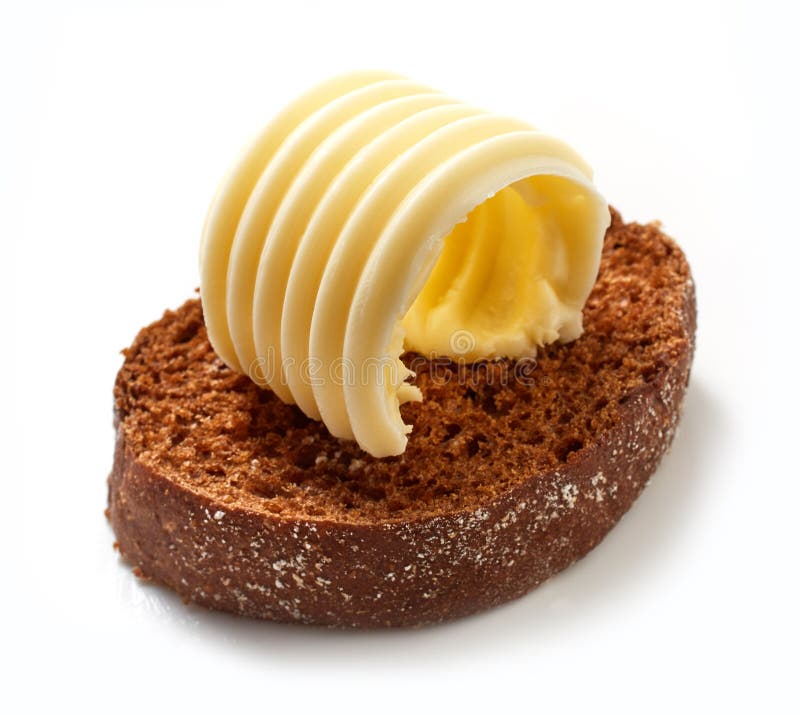 Butter Curl on Toast Bread. Healthy Breakfast with Bran Bread Toast ...
