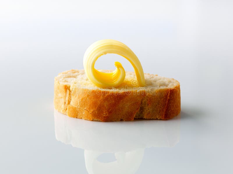 Butter Curl or Roll on Baguette Bread Stock Image - Image of margarine ...