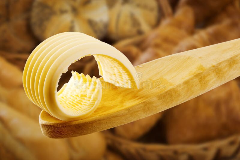 Butter curl on a knife stock photo. Image of milk, product - 10113510