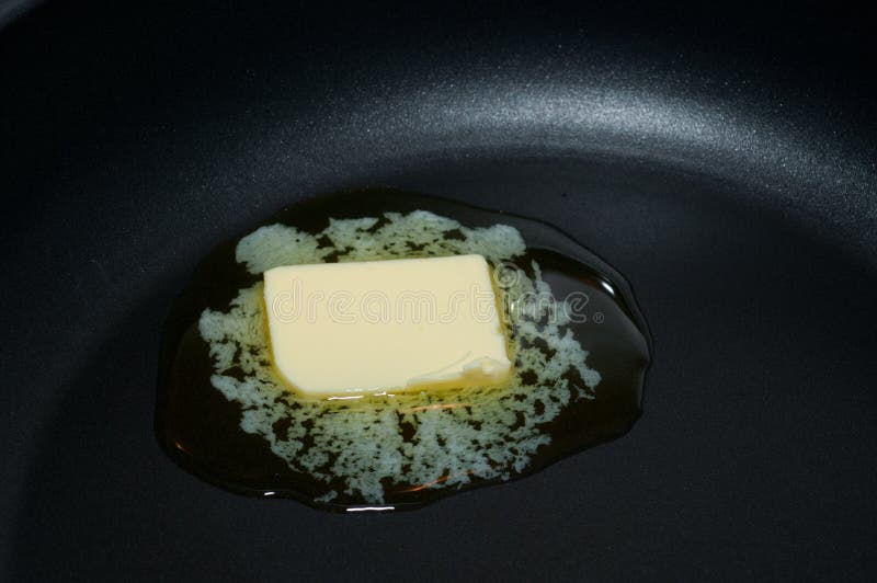 Butter in a hot pan stock image. Image of flocculate - 22917561