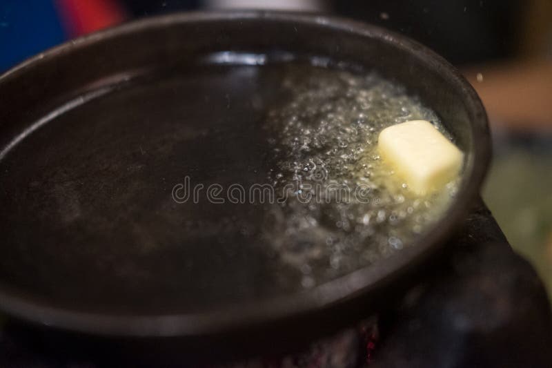 Butter Melting in Frying Pan Stock Photo - Image of boiling, eating ...