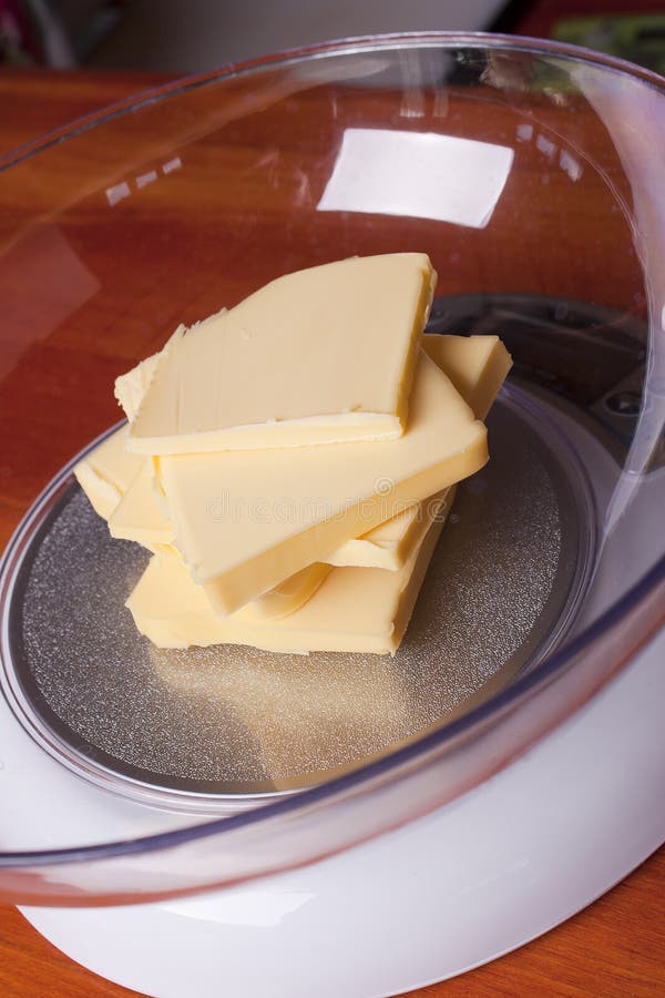 Butter on scale stock image. Image of ingredients, measure - 32582391