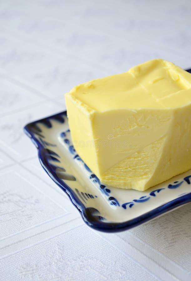 Butter on the table stock photo. Image of cholesterol - 85405656