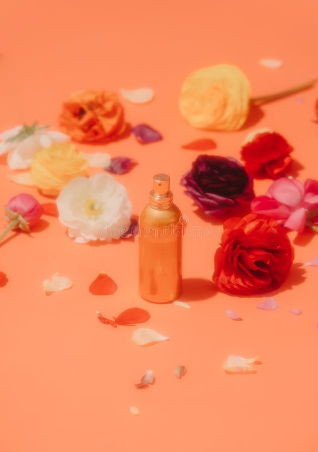 Buttercup Flowers and Perfume Bottle Stock Photo - Image of flowers ...