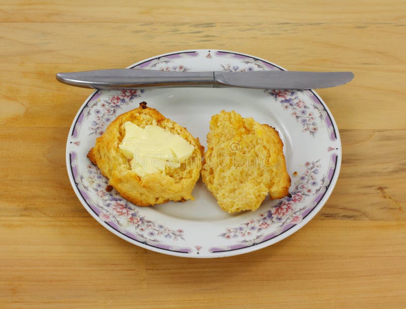 Buttered biscuit stock photo. Image of knife, golden - 17339380