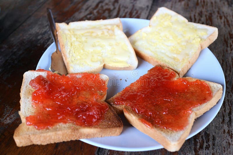 Buttered Bread and Strawberry Jam on Tableware Stock Image - Image of ...