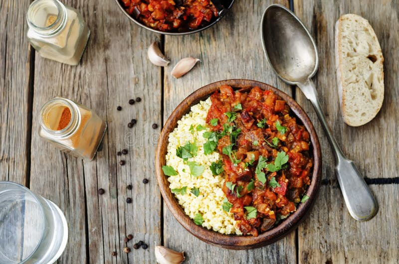 Buttered Millet with Tomato Eggplant Curry Stock Photo - Image of ...
