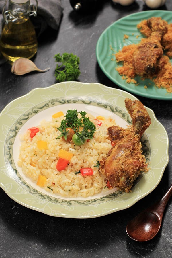 Buttered Rice with Paprika and Fried Chicken Stock Photo - Image of ...
