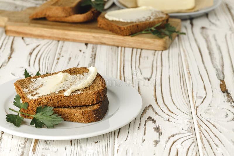 Buttered Slice of Rye Bread on Wooden Table Stock Image - Image of ...