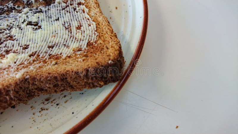 Breakfast Buttered Toast stock image. Image of buttered - 136878705