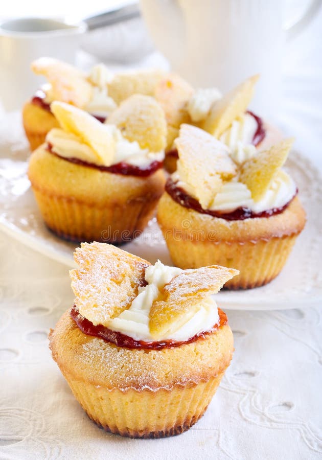 Butterfly cakes stock photo. Image of muffins, decorated - 38423070