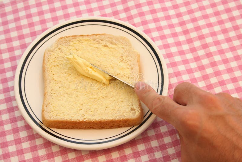 Buttering stock image. Image of nutrition, knife, checkered - 12040479