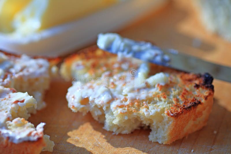 Buttering Toast on Sunny Morning Stock Photo - Image of breakfast ...