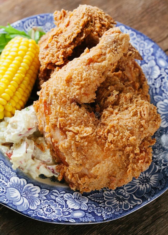 Buttermilk Fried Chicken with Corn and Potato Stock Photo - Image of ...