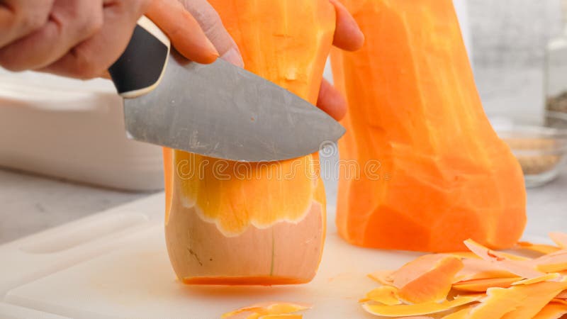 Butternut Squash Soup Recipe, Preparation Process. Woman Hands Peel and ... Butternut Squash Soup Recipe, Preparation Process. Woman Hands Peel and ...
