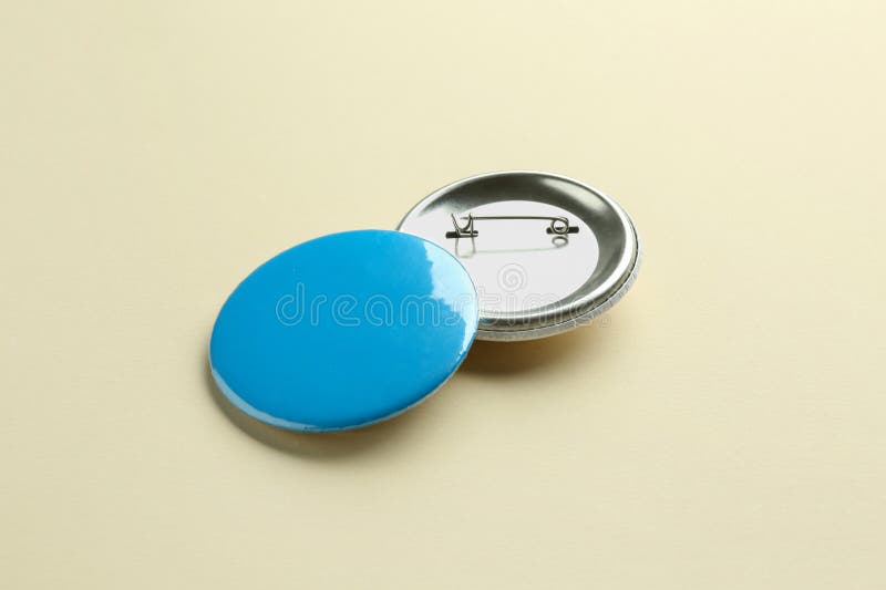 Button Badges on Beige Background. Mockup for Design Stock Photo ...