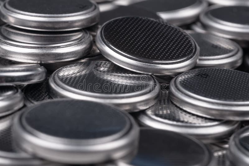 Button cells batteries stock image. Image of heap, electric - 53087737