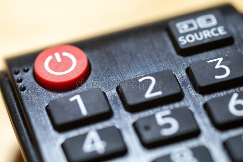Power Button Close-up on TV Remote Control with Braille and Copy Space ...
