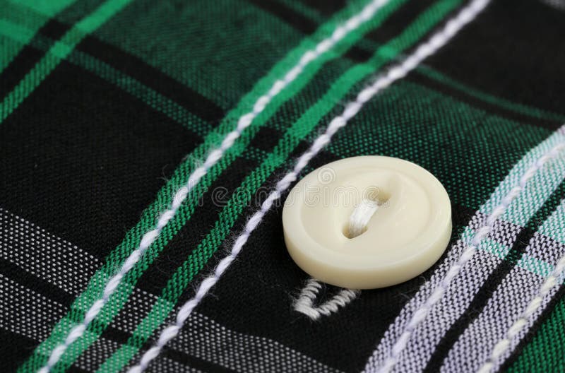 Button on a cloth stock photo. Image of texture, textile - 45875868