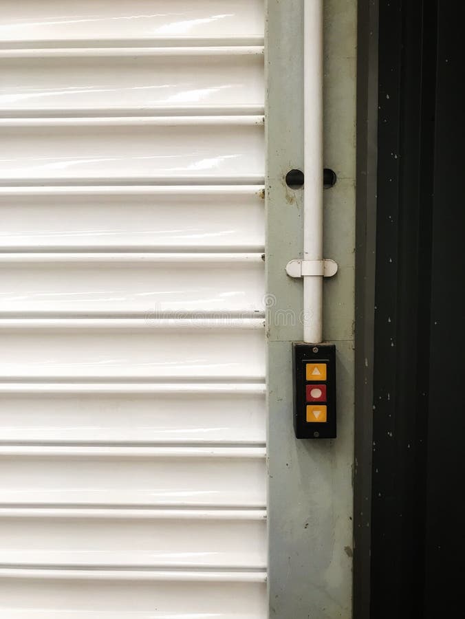 Button Electric Switch of Roller Shutter Door Stock Photo - Image of ...