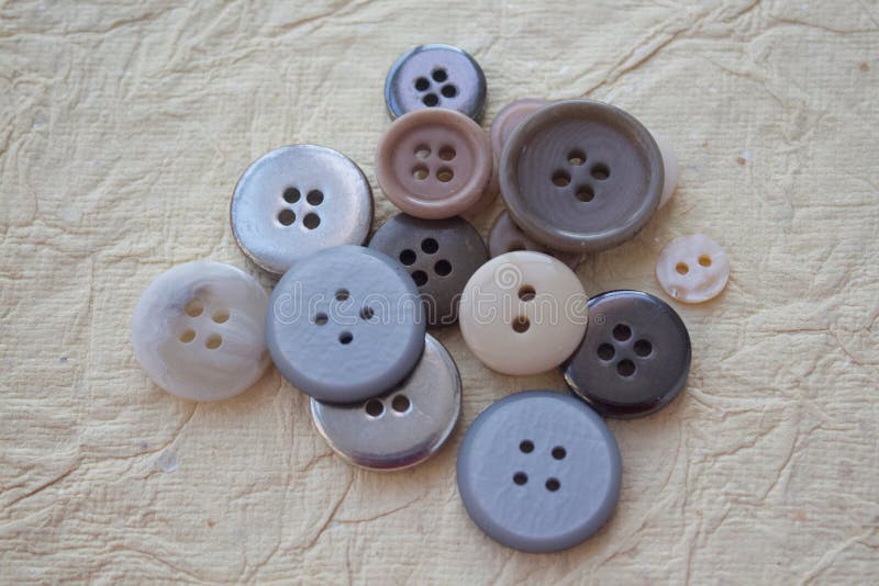 Button Mix Part of Dark, Grey and Creme Colors of Buttons on Light ...