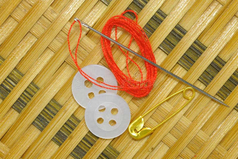 Button and needle stock image. Image of needle, clothes - 21950891