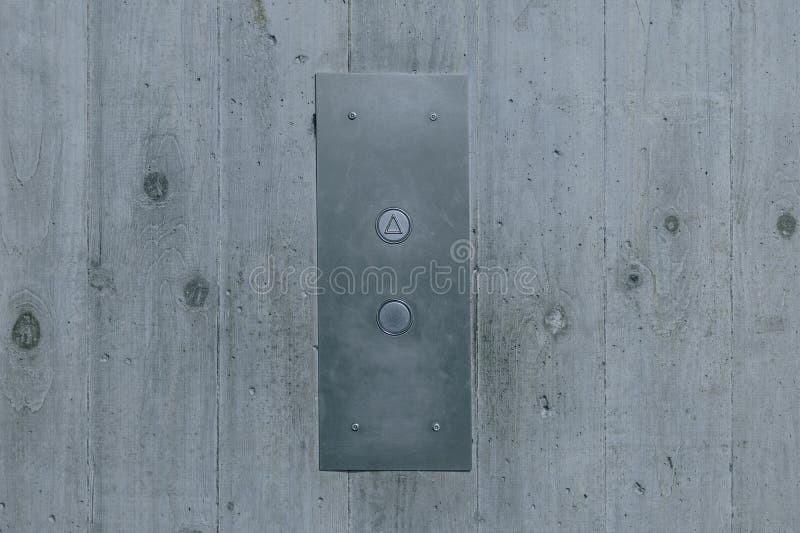 Button of a Passenger Lift or Elevator on Interesting Concrete Wall ...