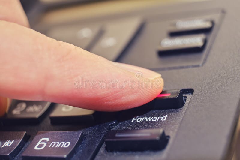 Button with Text Forward on a Landline Phone in the Office, Close-up ...