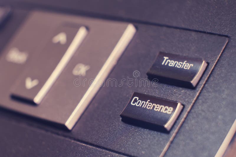A Button with the Text Transfer and Conference on a Landline Phone in ...
