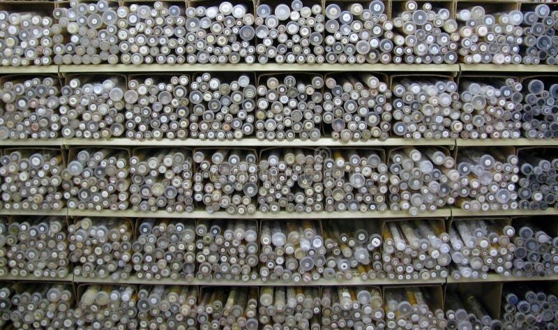 Large Selection of Buttons in Display Tubes on Store Shelves Stock ...