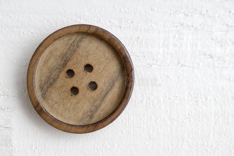 Button on a wooden table stock photo. Image of industry - 54946290
