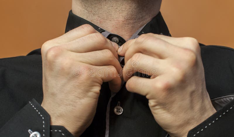 Buttoning a black shirt stock photo. Image of event, groom - 85443908