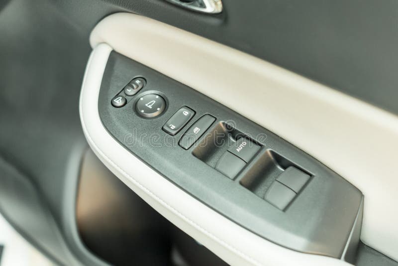 The Buttons for Controlling the Mirrors Electric Drive on the Center ...