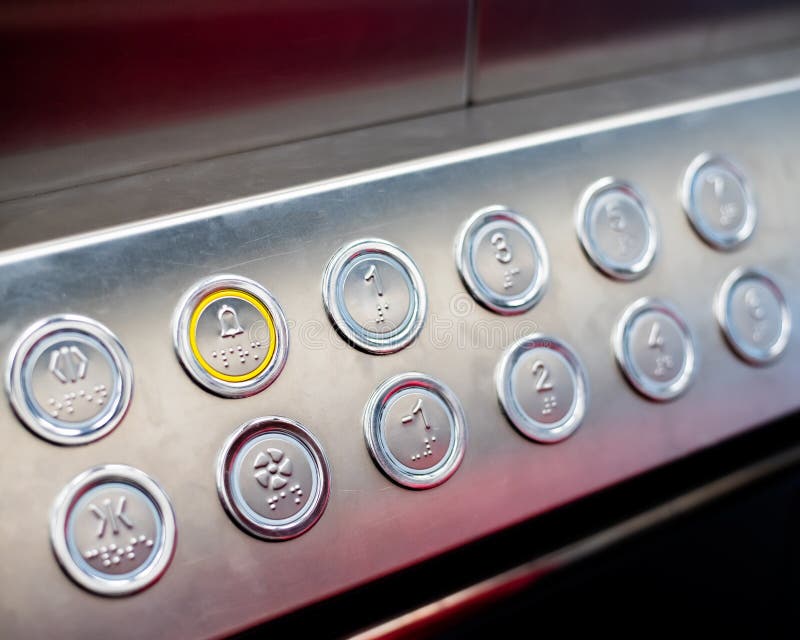Buttons in the Elevator with Braille Code for Blind People Stock Image ...