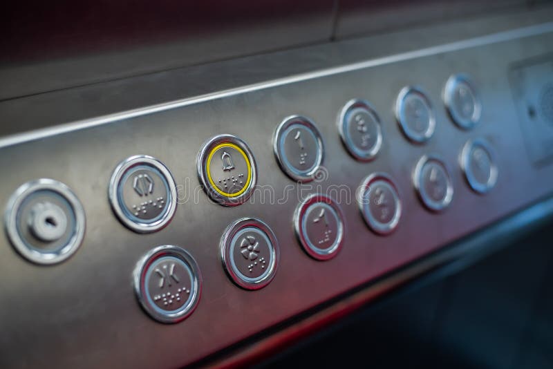 Buttons in the Elevator with Braille Code for Blind People Stock Photo ...