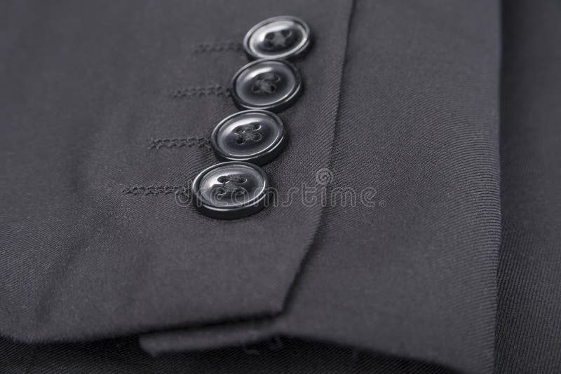 4 Buttons on a Man Sleeve Suit Stock Photo - Image of button, material ...