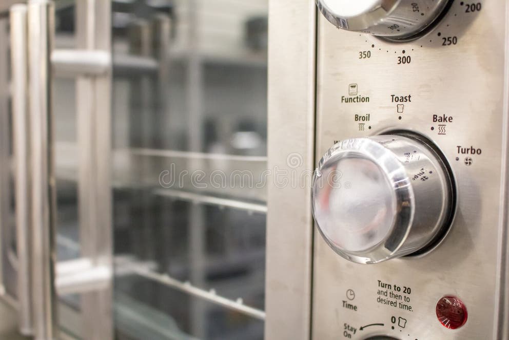 Buttons on an oven stock photo. Image of conventional - 158168290